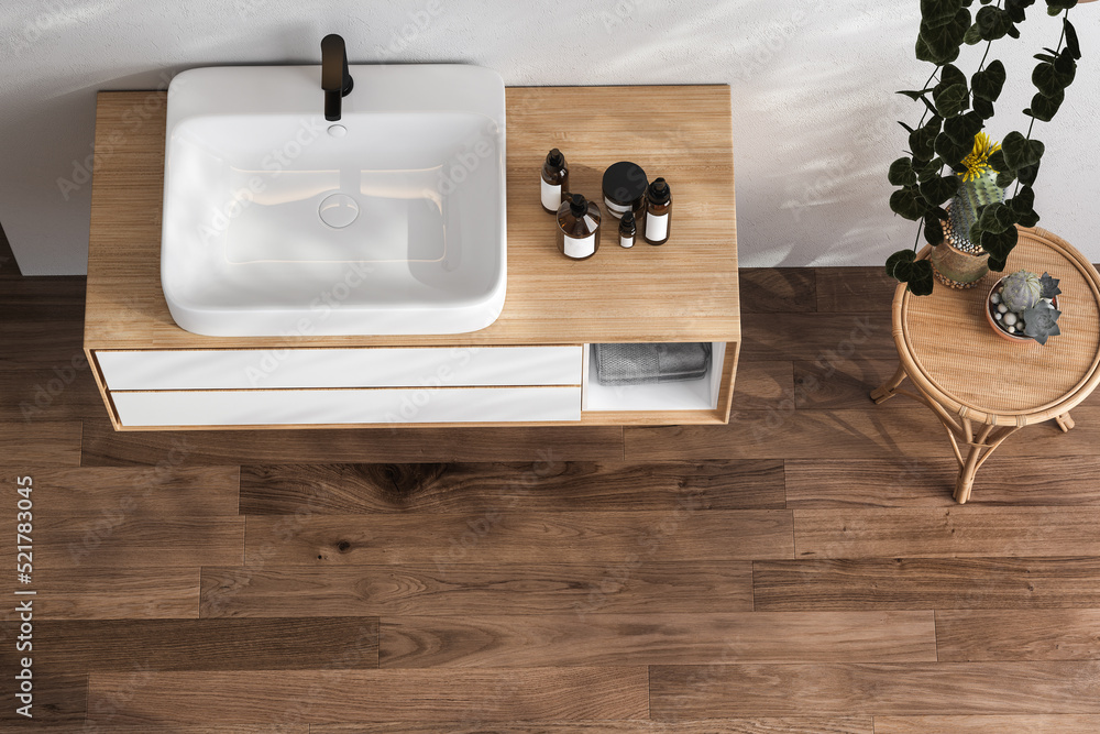 Top view an wooden vanity counter with whiteceramic washbasin and ...