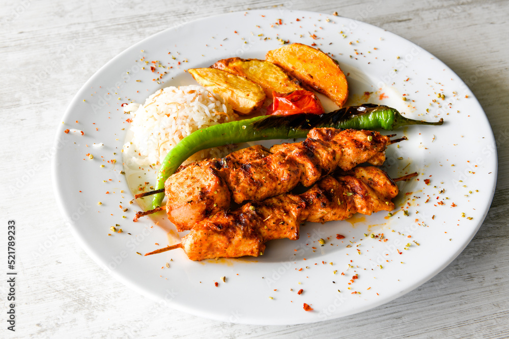 Chicken wings barbeque in a dish with BBQ grill sauce . Izgara tavuk ...