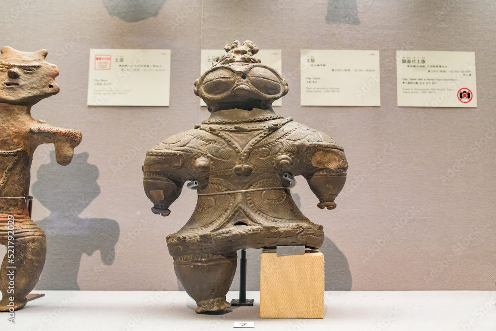 TOKYO, JAPAN - JUL 20, 2022: Clay Figurine ("Dogu") in the Jomon Period ...