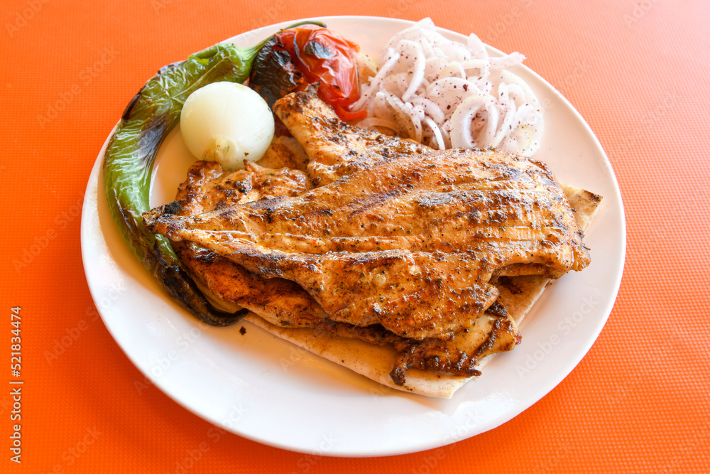 Chicken wings barbeque in a dish with BBQ grill sauce . Izgara tavuk ...