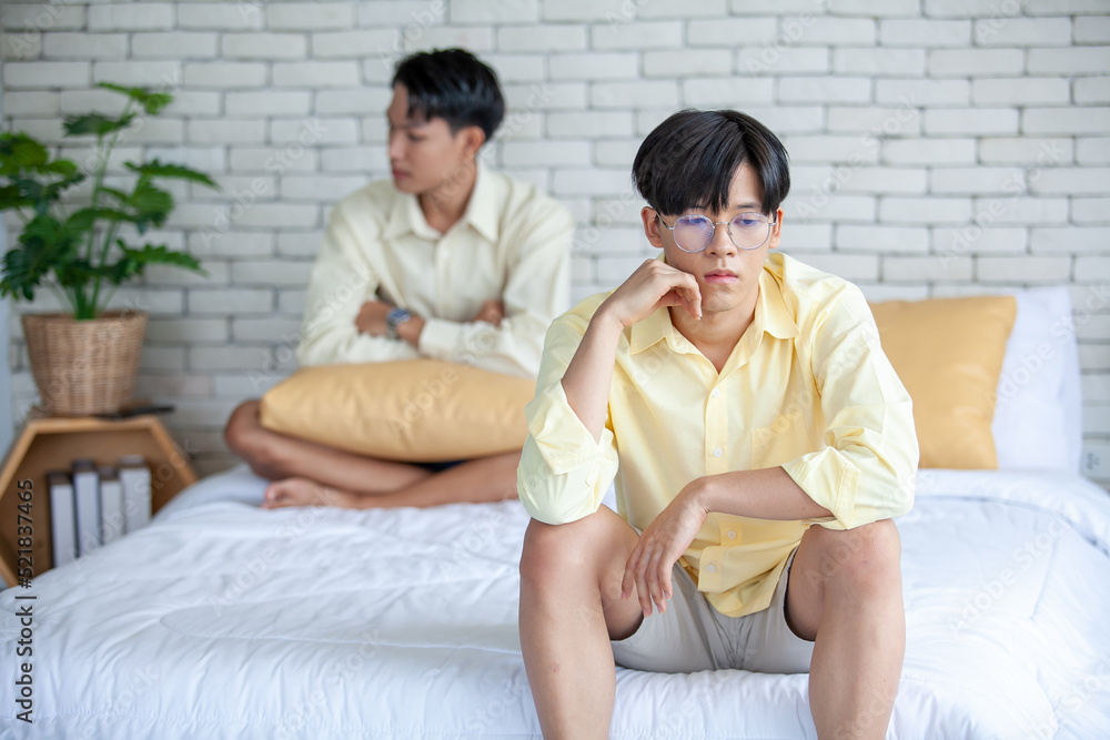 Asian gay couples are quarreling, angry or sad on bed in home, LGBTQ ...