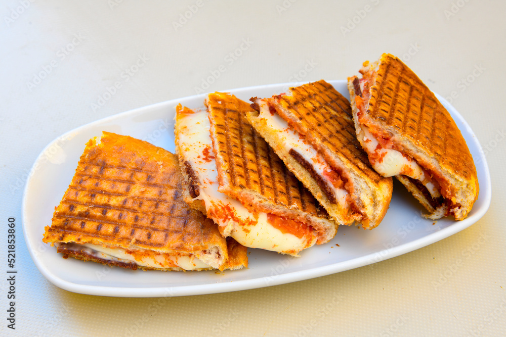 Turkish karisik atom tost ( kasarli bazlama tost) . Flat baked bread ...