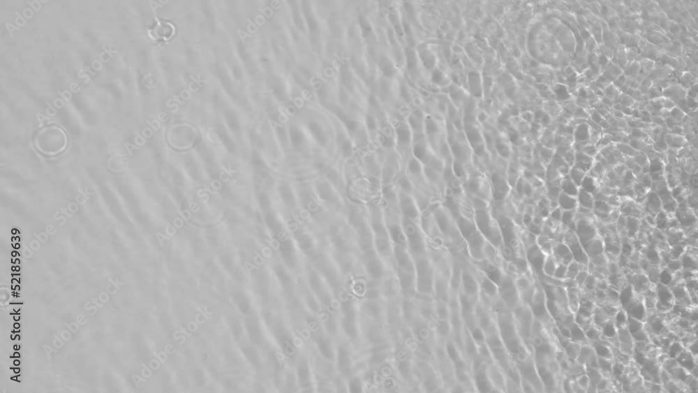 Transparent clear calm water surface texture with waves, splashes and ...