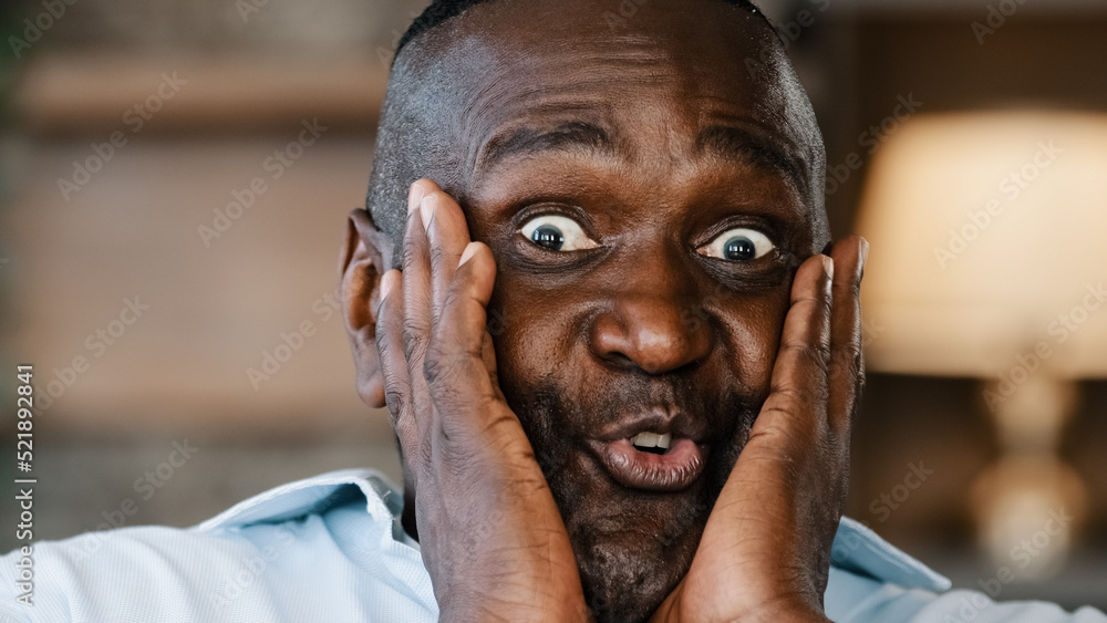 Surprised portrait african american ethnic joyful emotional man ...