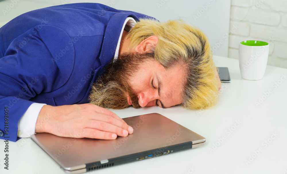 Tired businessman sleep on work desk. Office employee sleeping at ...