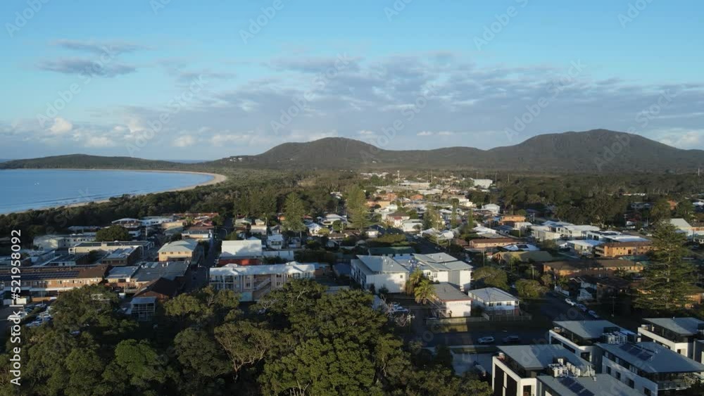 Vidéo Stock Revealing aerial view of the coastal town of South West ...