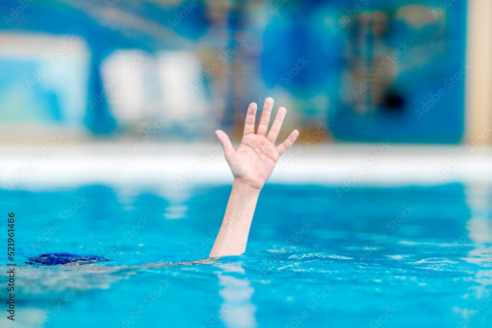 The child is drowning in the swimming pool. Danger The child is ... The child is drowning in the swimming pool. Danger The child is ...