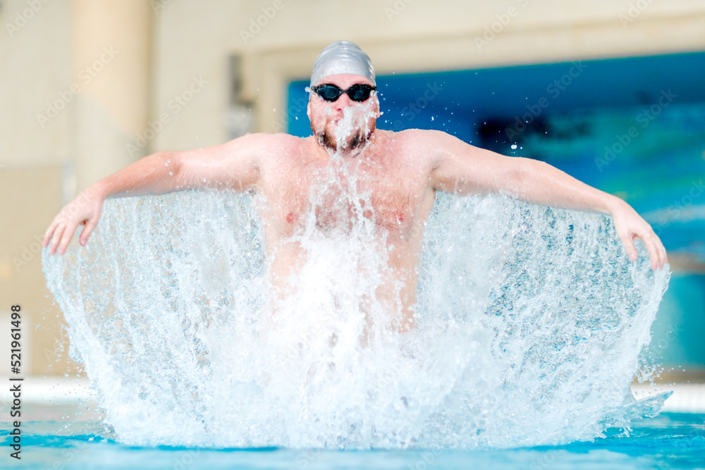 Fat man in the swimming pool. Sports exercises Stock Photo | Adobe Stock