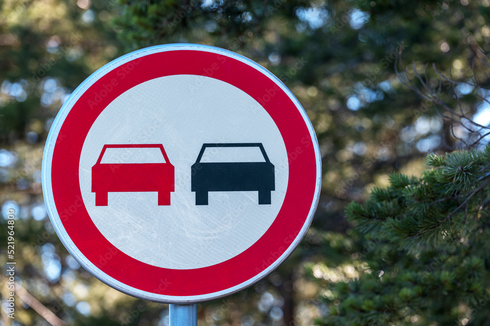 Circle Road Sign No overtaking road traffic sign with Forest Background ...