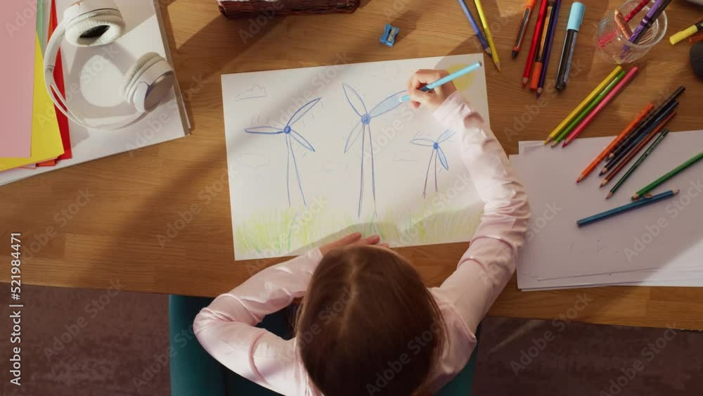 Top View: Little Girl Drawing Beautiful Wind Turbines that Look Like ...