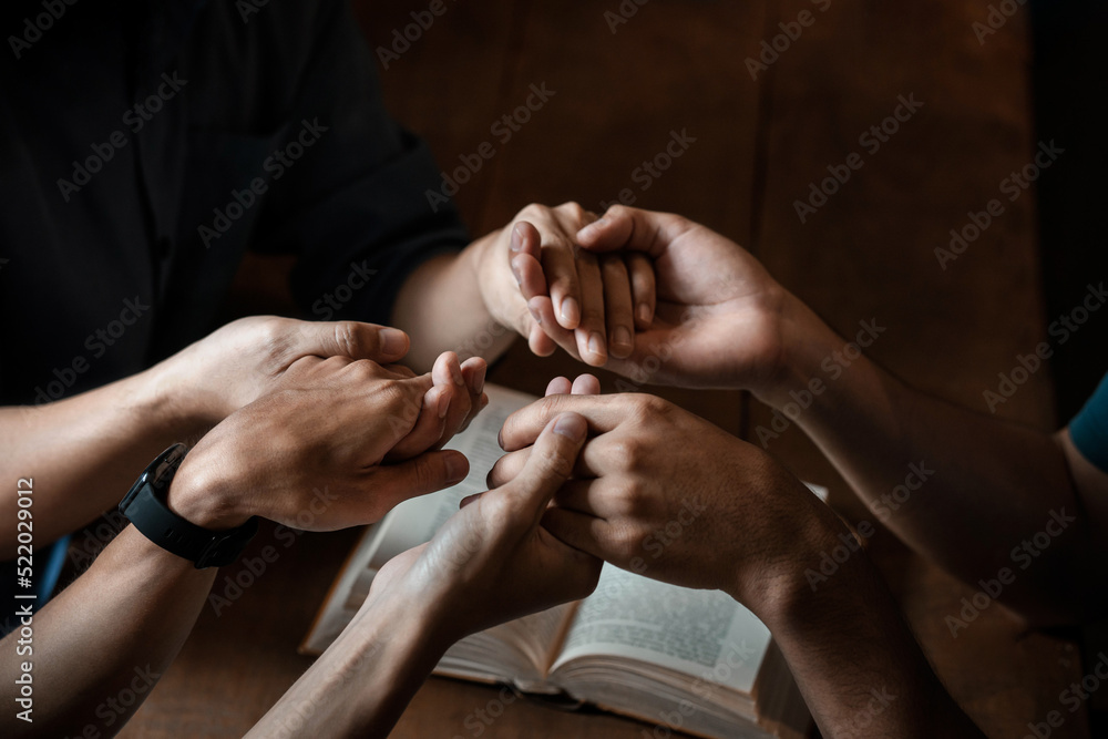 Group Prayer Holding Hands