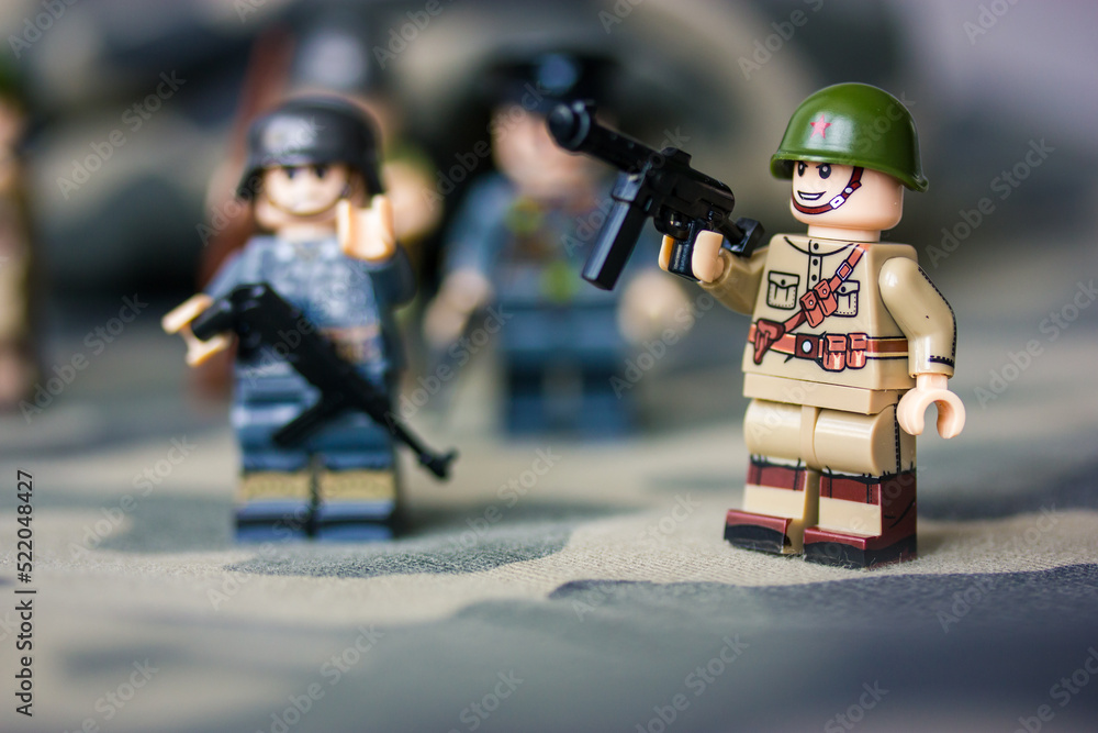 Kyiv, Ukraine. March 9, 2022. Military man with machine gun. LEGO ...