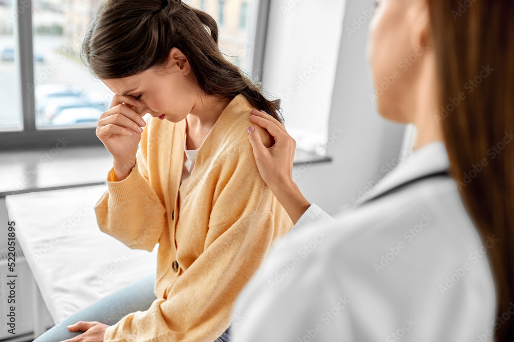 medicine, healthcare and people concept - female doctor comforting to ...