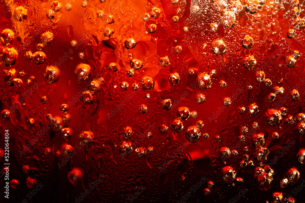 macro cola drink texture,macro soft drink texture,Close up view of ice cubes in dark cola ...