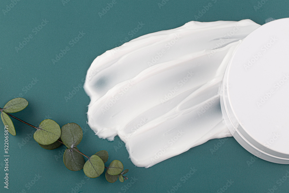 Cosmetic cream formulation image with a green background Stock Photo ...
