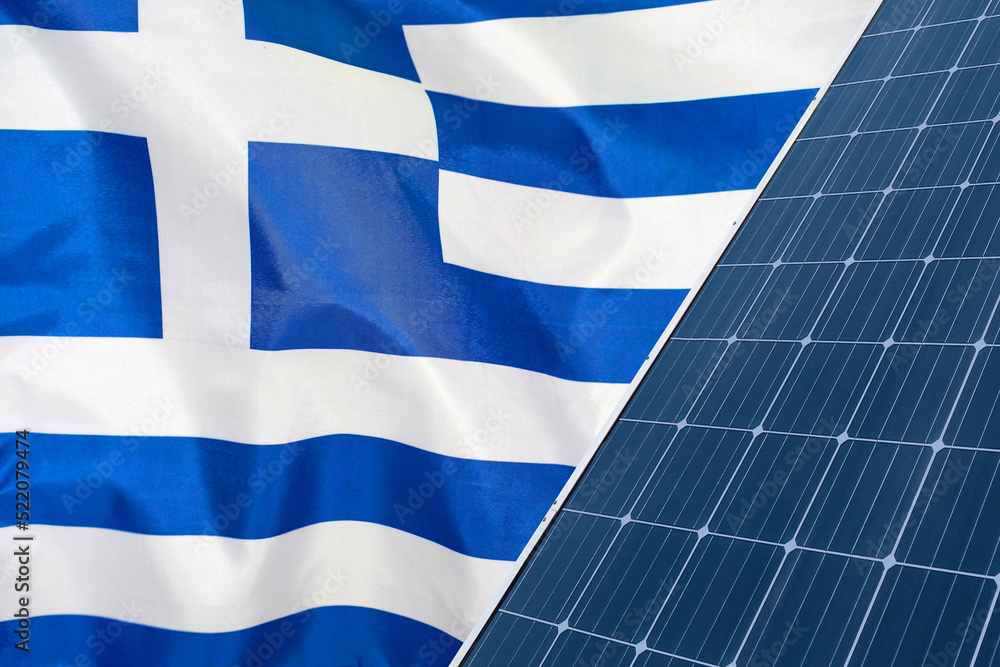 Solar panels against flag Greece background. Solar battery generates a ...