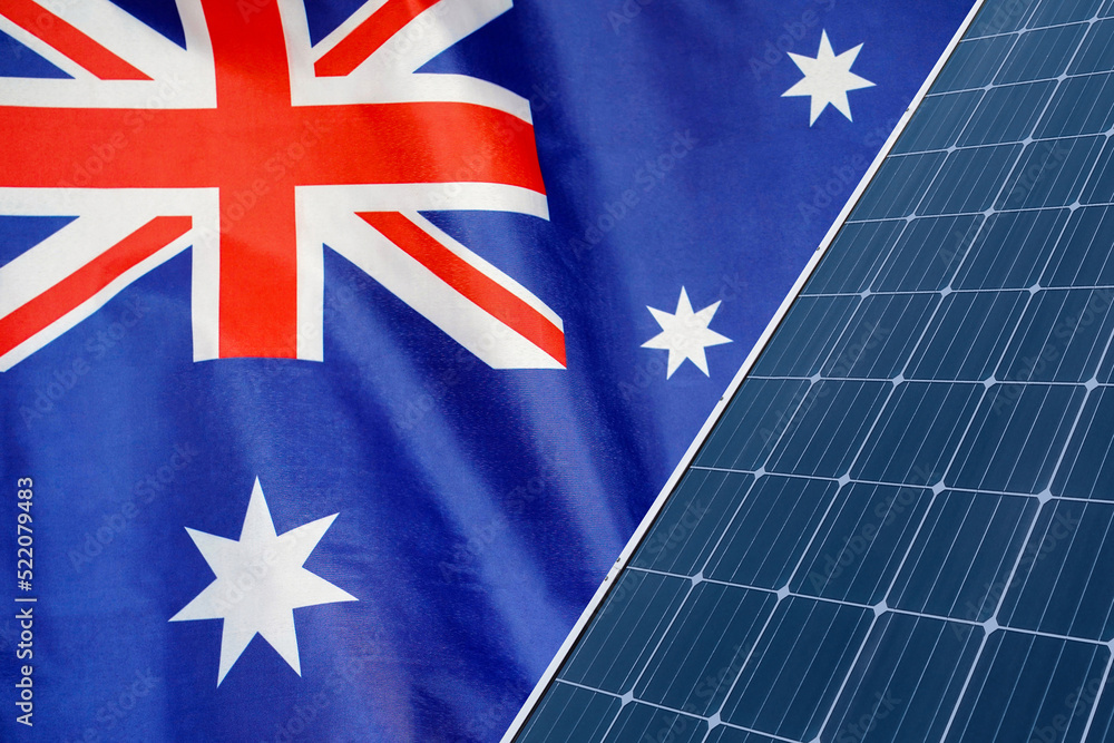 Solar panels against flag Australia background. Solar battery generates ...