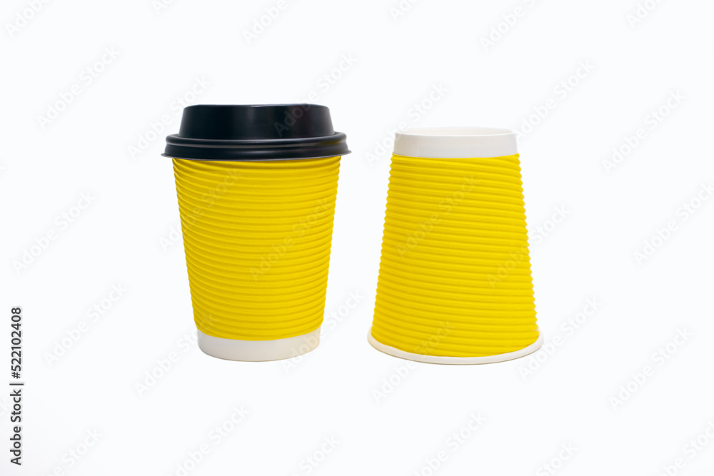 Disposable yellow cardboard coffee cups isolated on white background ...