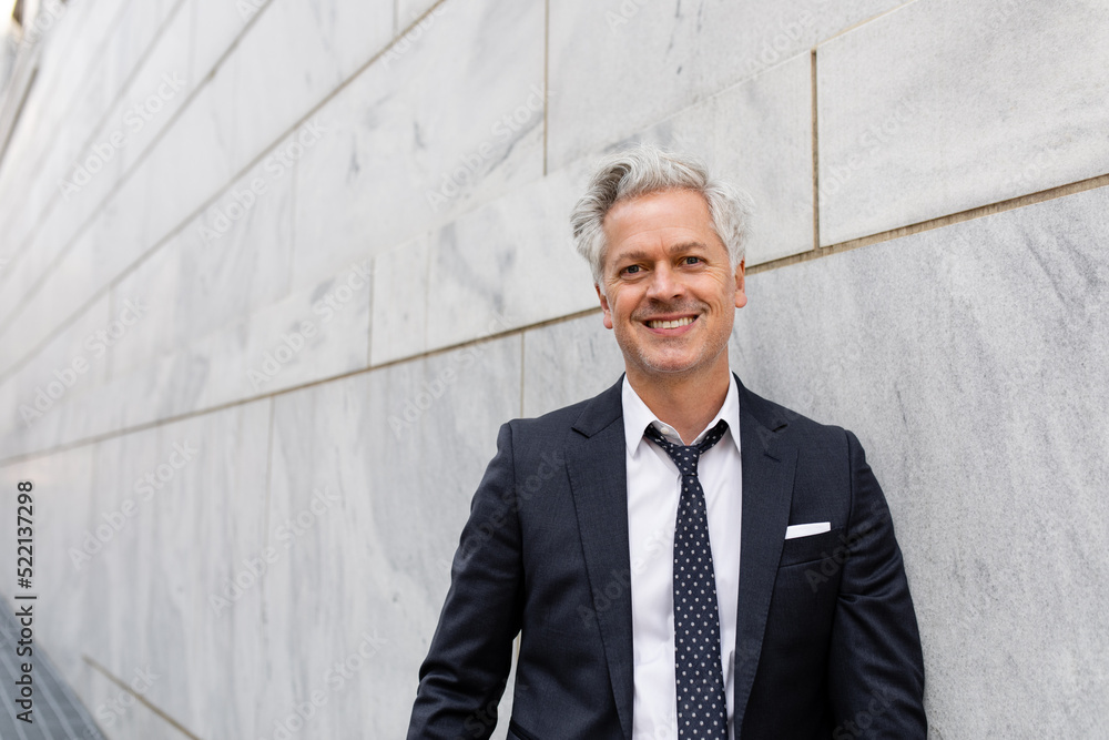 Professional Man Smiles At Camera After Loosening His Tie After Work ...