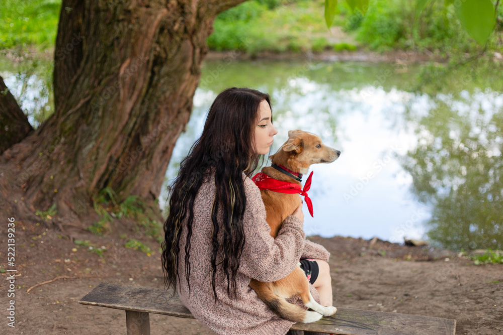 sad girl with dog Stock Photo | Adobe Stock