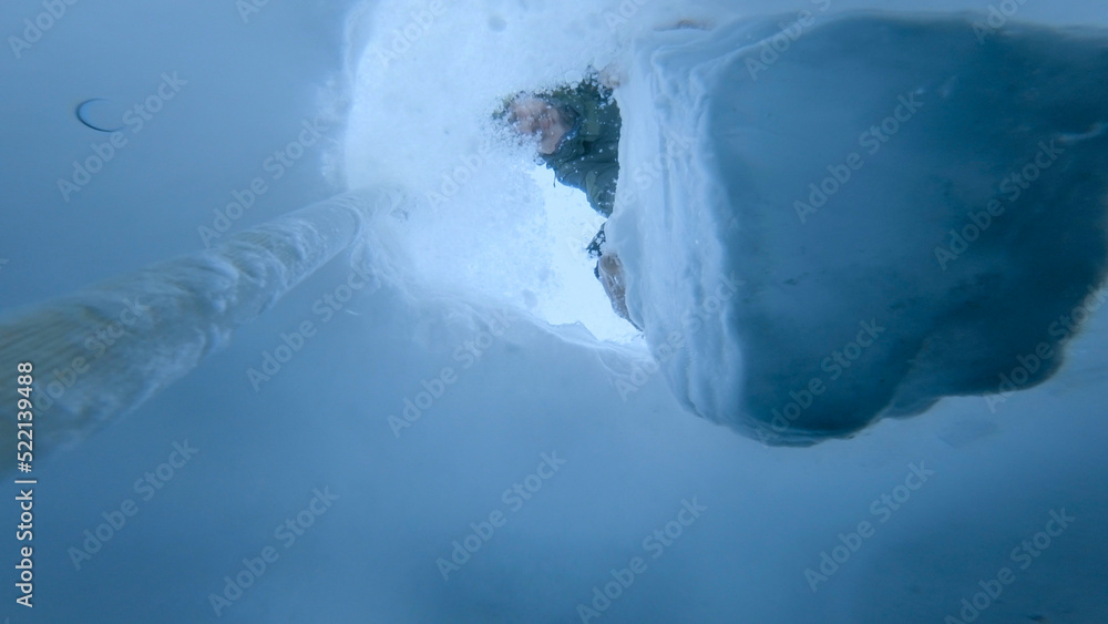 Winter sea ice Indigenous Inuit tradition: underwater ice fishing hole ...