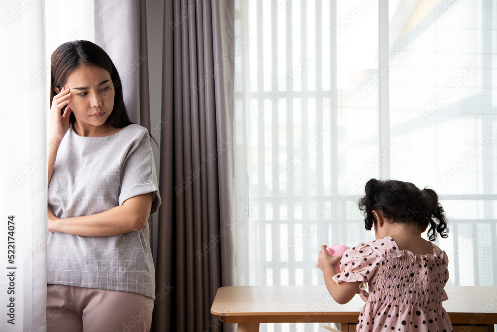 Unhappy Asian Mother Touching Forehead Feeling Tired Of Bad Daughter S