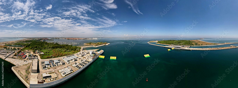 Venice MOSE tide barrier floodgates: sea level rise climate adaptation ...