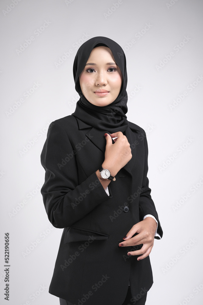 Portrait of a female wearing a hijab, a form of lifestyle garments for ...