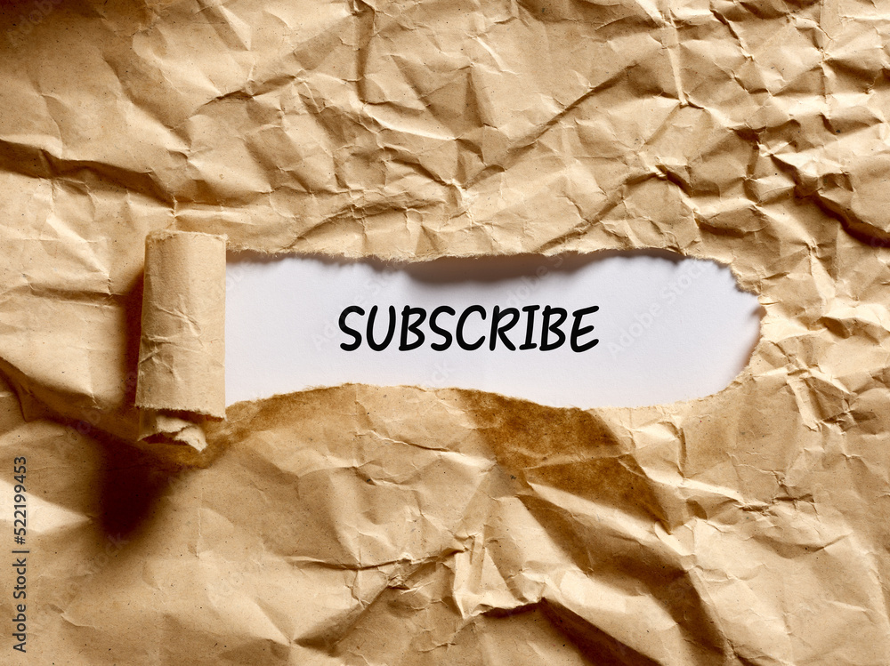 The word subscribe written under a brown torn paper. Membership ...