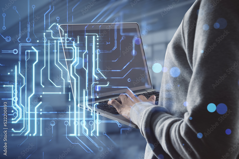 hacker hands holding laptop keyboard with creative house chip circuit ...