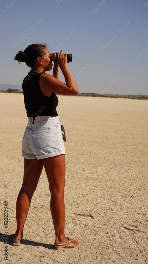 Attractive brunette woman poses in dry salty lake new goals for her ...
