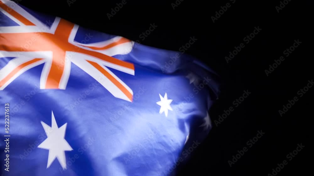 National Australian Flag. Black background. Australian Flag waving ...