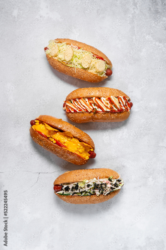 Fast food hot dog banner on a light grey stone textured background ...