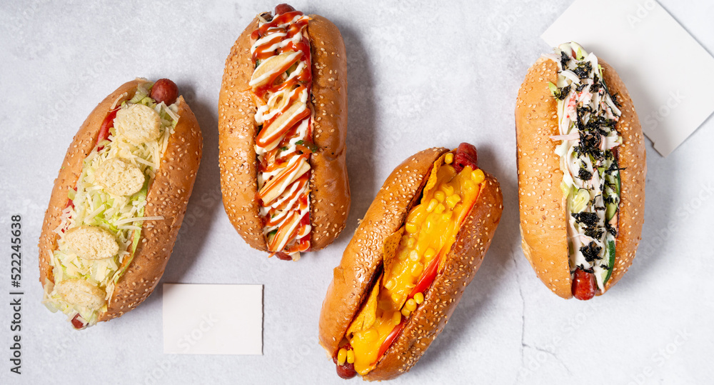 Fast food hot dog banner on a light grey stone textured background ...