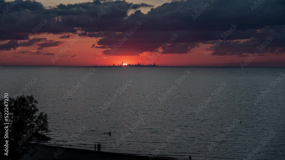 Sunset Timelapse of the sun dropping behind and below the Chicago ...