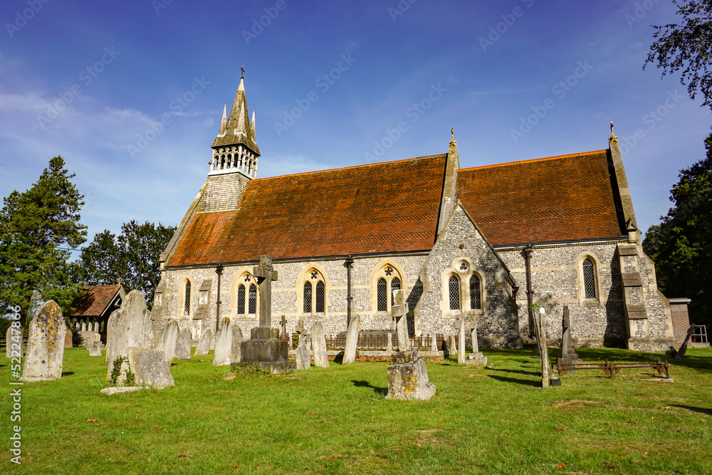 church in the countryside. typical English stone church viewed from ...