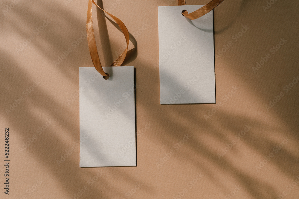 Top view of swing tag mockups and overlay shadows. Label hang tag ...