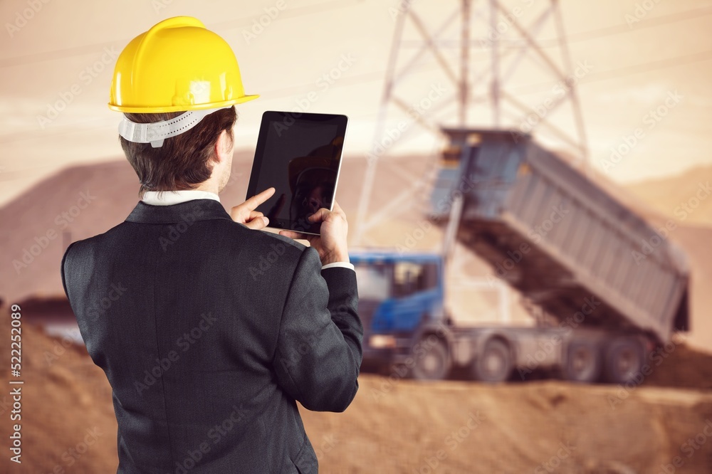 Construction engineer under inspection and survey workplace and worker ...