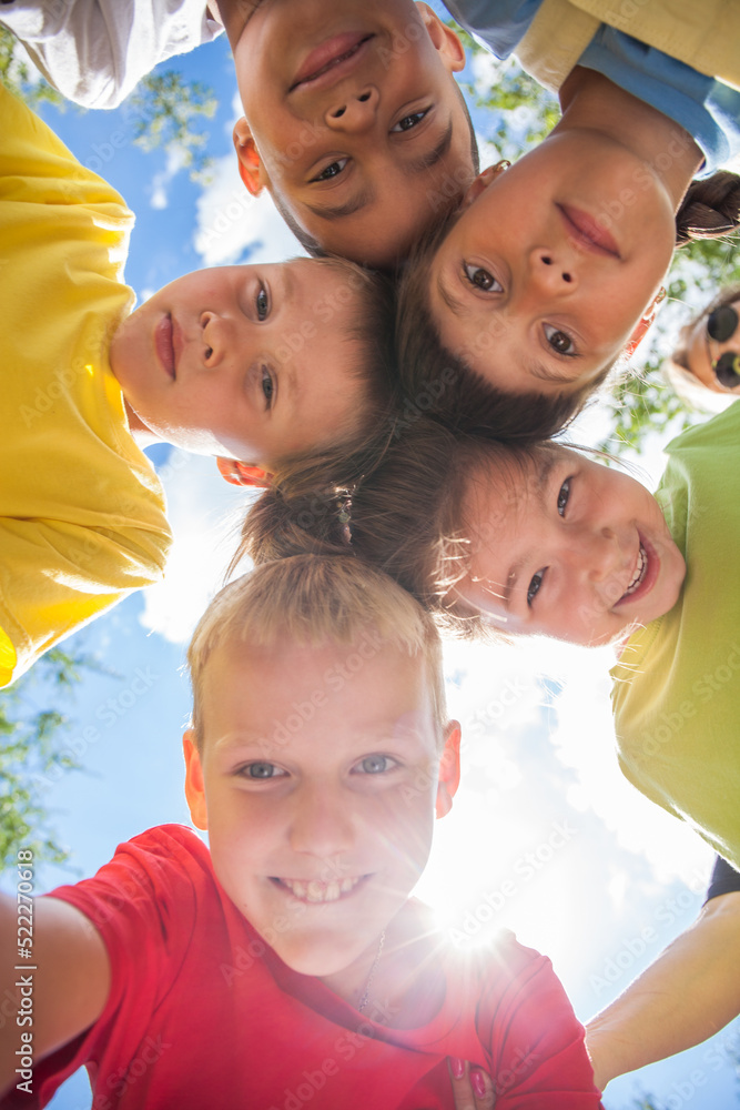 Happy faces of children bottom view Stock Photo | Adobe Stock