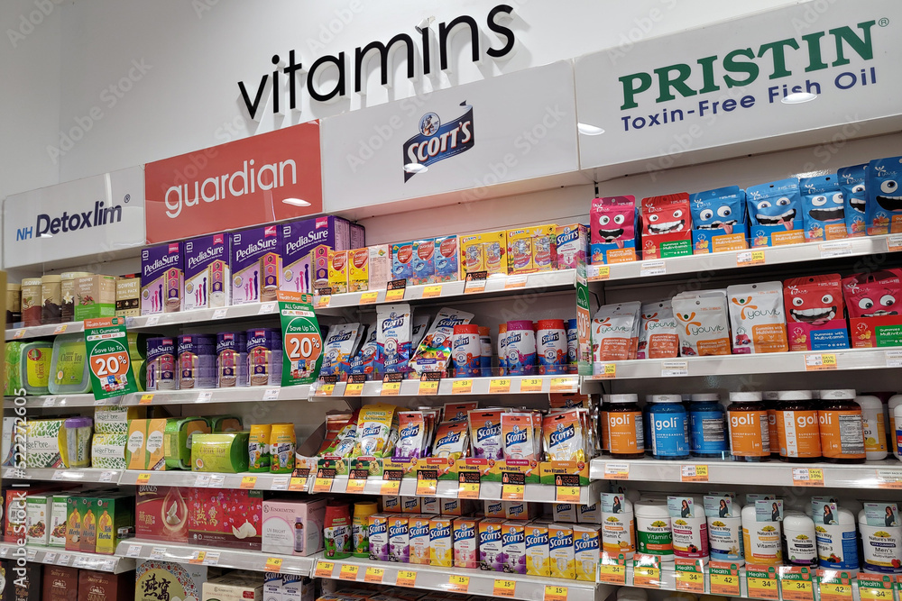 PENANG, MALAYSIA - 23 JULY 2022: Various brand vitamins and supplements ...