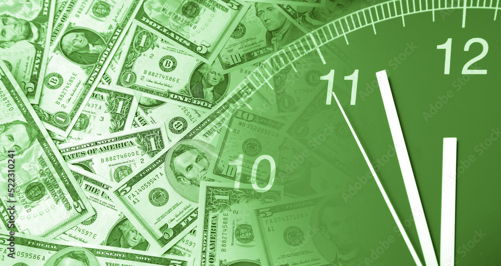 Clock and assorted American coins banknotes. Time is money idea Stock ...