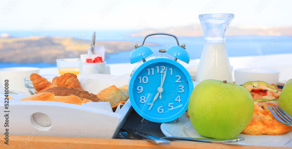 Blue alarm clock Intermittent fasting eight hour feeding window concept ...