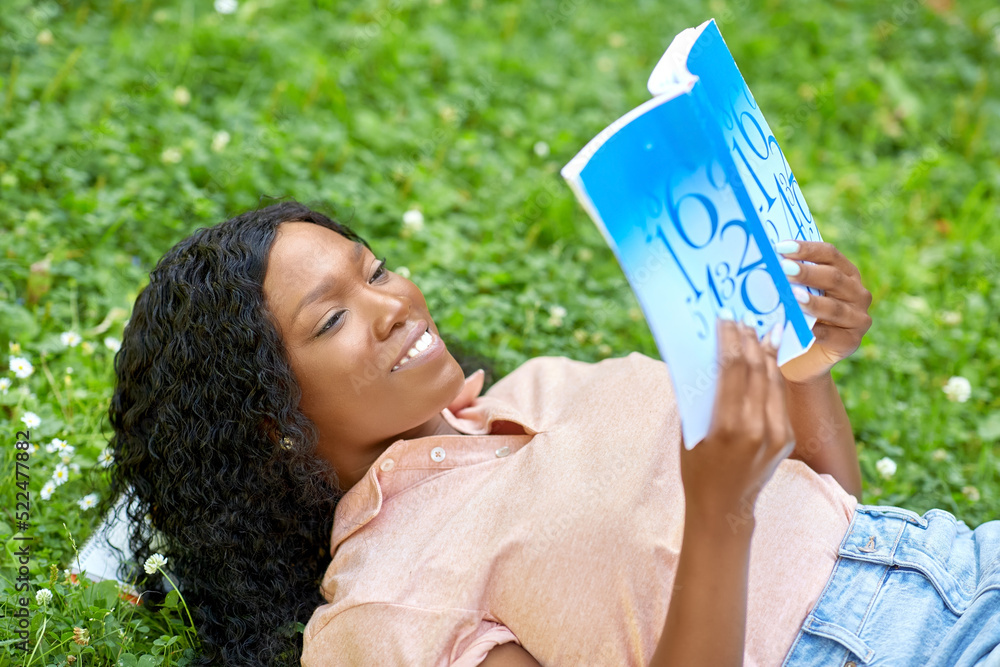 education, school and people concept - happy smiling african american ...