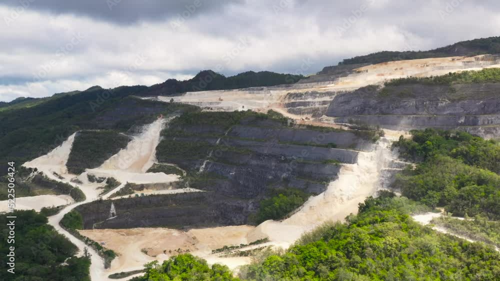 Open pit limestone quarry in the mountains of Bohol Island, Philippines ...