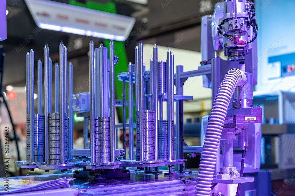 Steel ring or metal workpiece arranged in vertical rows for move to ...