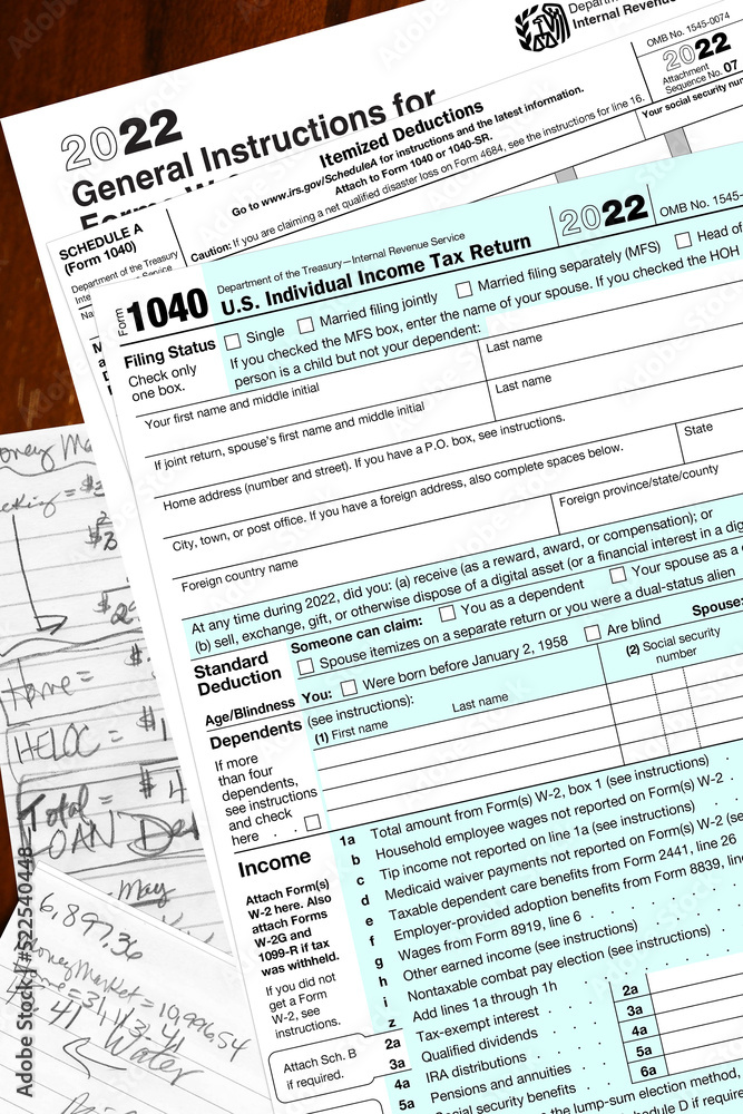 2022 IRS tax forms on a desktop. Stock Photo | Adobe Stock