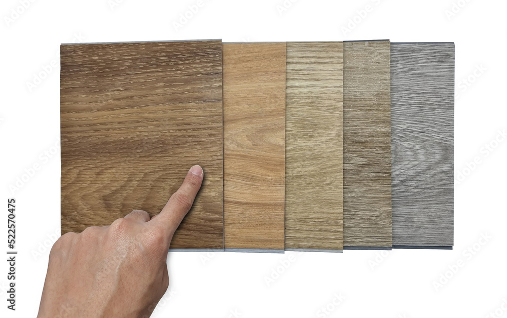 hand picking or selecting modern vinyl flooring tile chart. stack of ...