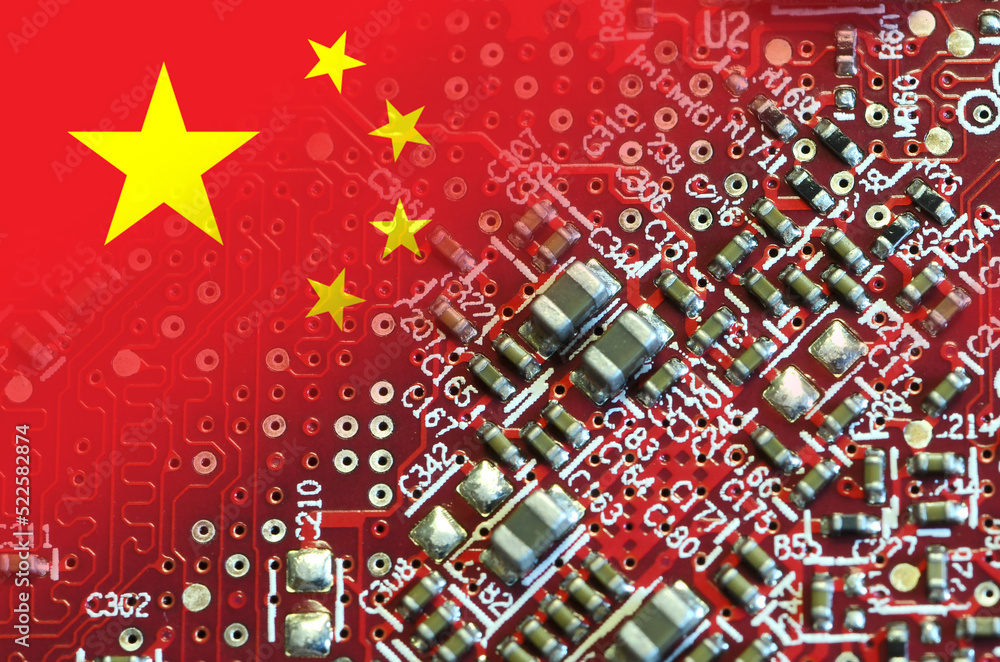 Flag of China on the components of an electronic board. China is one of ...