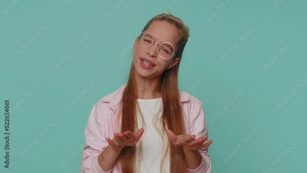 Hey you, be careful. Teenager girl warning with admonishing finger ...