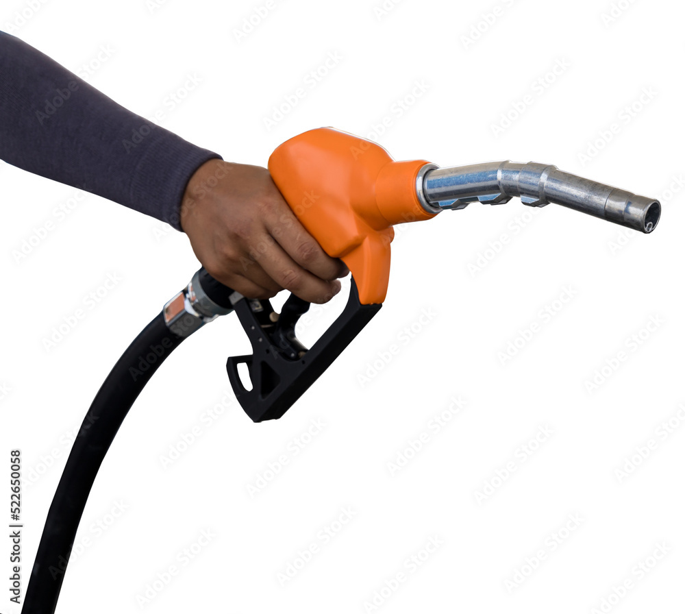 Hand holding gas nozzle with one last drop. A man holding a gasoline ...